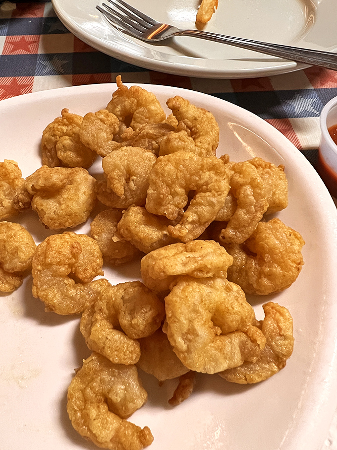 These popcorn shrimp aren't just fried, they're transformed&mdash;tiny morsels of ocean sweetness wearing jackets of crispy perfection that crackle with each bite.
