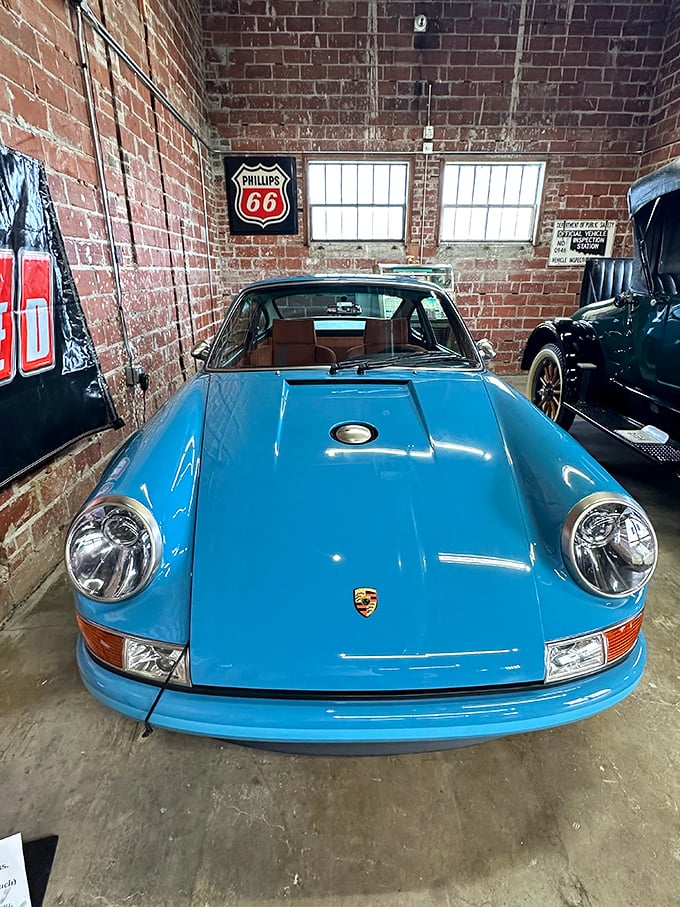 The powder blue Porsche 911 waits patiently, as if saying, "Yes, I know I'm gorgeous. Take your time admiring me."