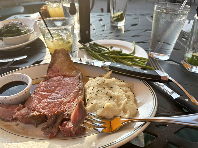 Comfort food aristocracy: Prime rib with a side of cloud-like mashed potatoes and that essential cup of au jus. Some partnerships just make cosmic sense.