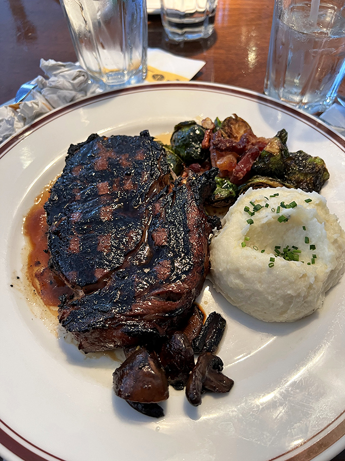 A triumvirate of deliciousness: prime rib, roasted Brussels sprouts, and mashed potatoes&mdash;the holy trinity of comfort food.