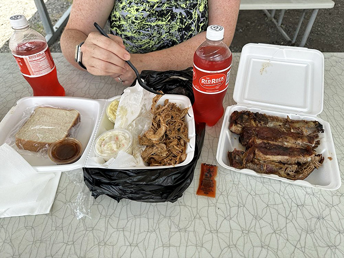 Picnic table feasting at its finest&mdash;where plastic utensils meet world-class barbecue and nobody's complaining about the dress code.