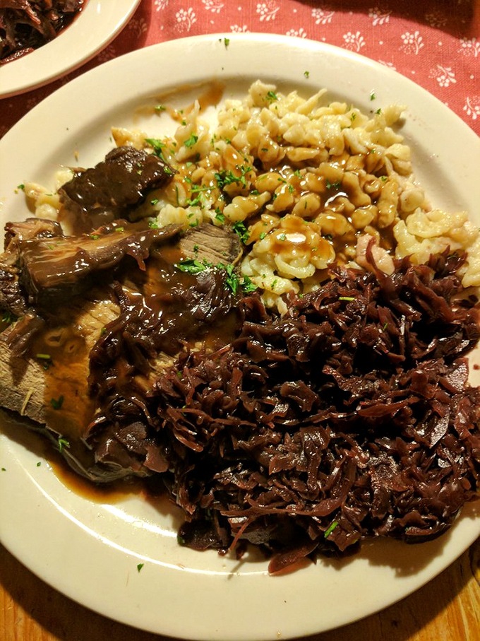 Sauerbraten that's been marinating longer than some relationships last. Fork-tender beef alongside sp&auml;tzle that's ready to soak up every drop of that magnificent gravy.