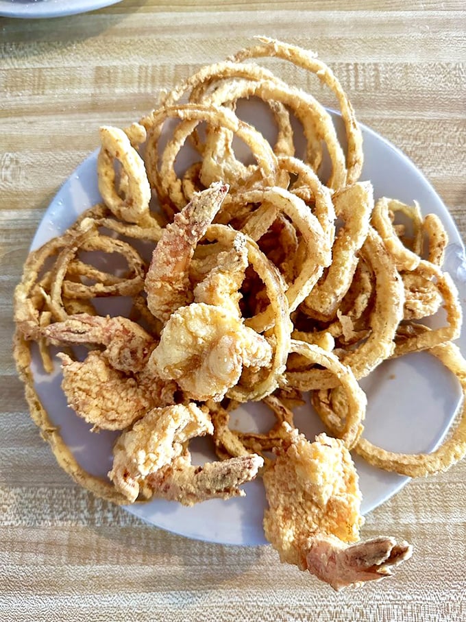 These onion rings aren't sidekicks&mdash;they're co-stars, achieving that perfect balance between crispy exterior and sweet, tender interior. Oscar-worthy supporting actors.