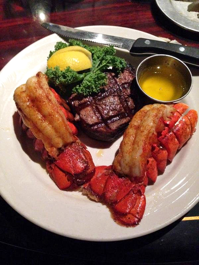 Surf meets turf in a romance that would make Neptune jealous&mdash;a perfectly seared filet mignon chaperoned by two magnificent lobster tails.