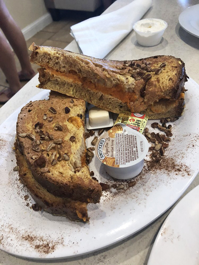 This isn't just French toast&mdash;it's architectural breakfast brilliance with nuts, possibly sweet potato, and a sprinkle of culinary magic.