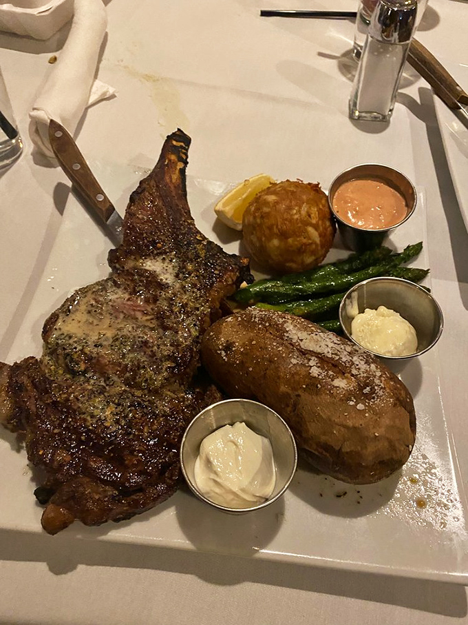 A T-bone that would make Fred Flintstone jealous, accompanied by sides that refuse to be overshadowed despite the steak's star power.