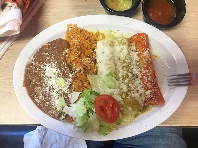 These enchiladas aren't just covered in sauce&mdash;they're embraced by it. The melted cheese pulls away in strings that belong in a food commercial.