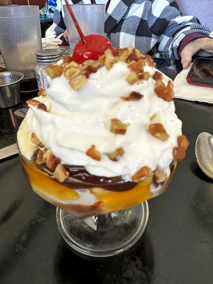 The turtle sundae arrives like royalty&mdash;crowned with whipped cream, robed in caramel and chocolate, and bejeweled with pecans that add the perfect crunch.