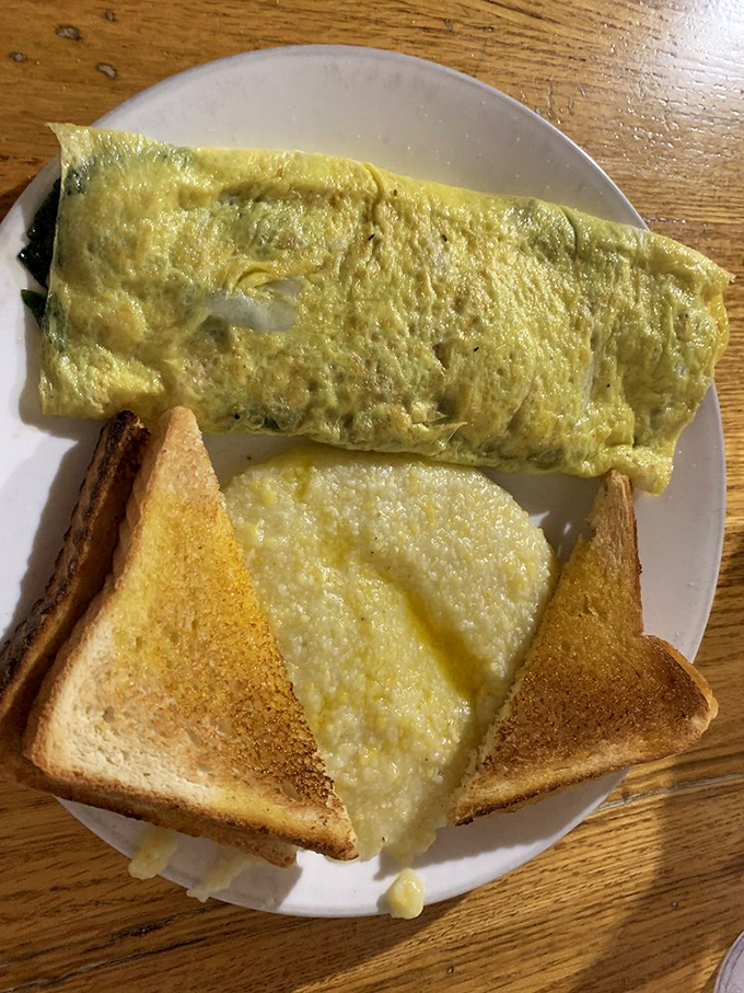 Veggie omelets often play second fiddle, but not here. This fluffy yellow envelope stuffed with garden treasures makes plant-based eating feel downright indulgent.
