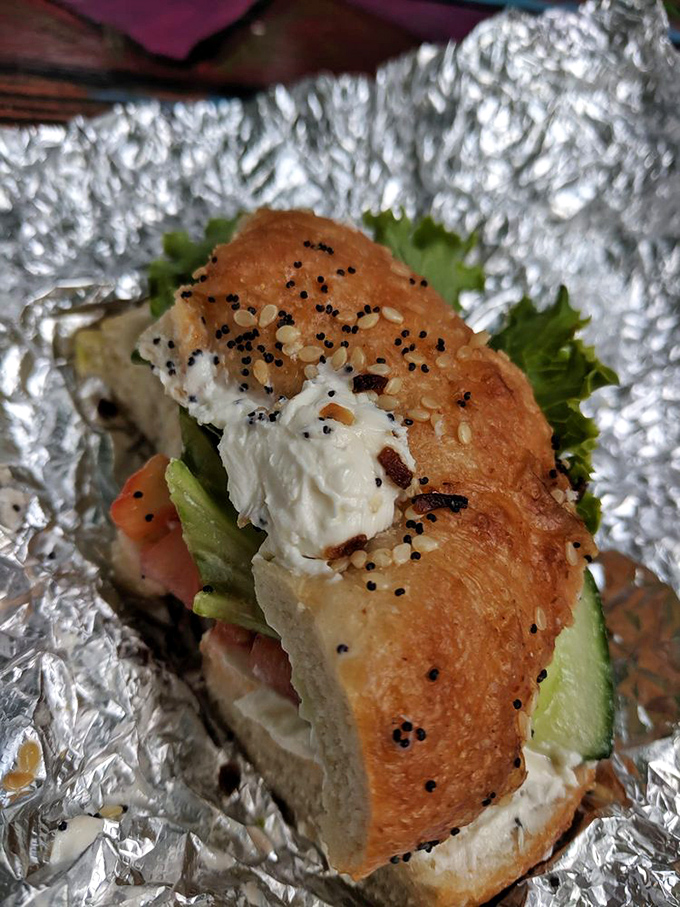 A bagel that's practically a farmers' market in handheld form. The cream cheese acts as the perfect diplomatic liaison between all those fresh veggies.