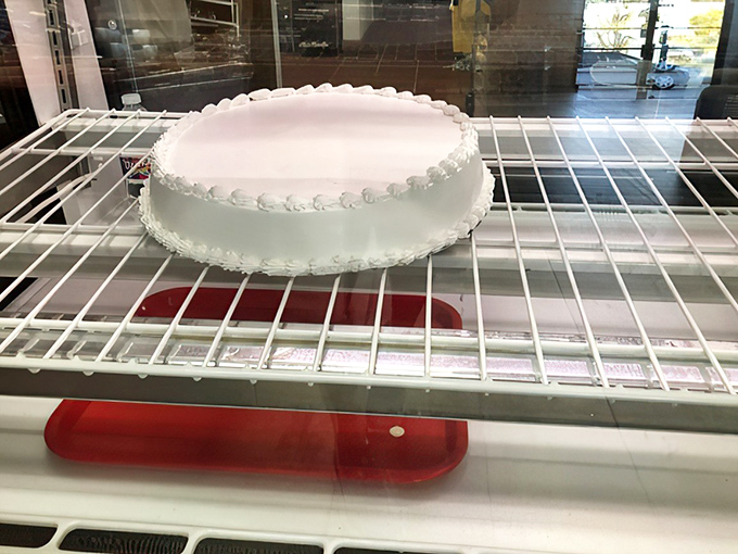 Simplicity at its finest&mdash;a classic white cake awaiting its destiny. Like a blank canvas before Picasso, this cake holds infinite sweet possibilities.