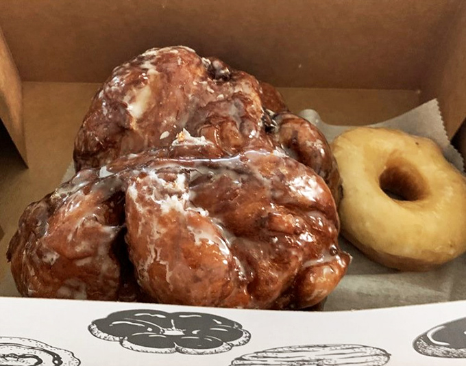 The apple fritter: nature's way of saying "You deserve something gloriously irregular and caramelized today." A beautiful mess of apple-cinnamon chaos.