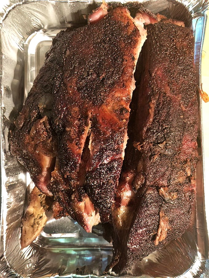 Rib architecture that defies gravity. The structural integrity of that bark holding impossibly tender meat is engineering at its tastiest.