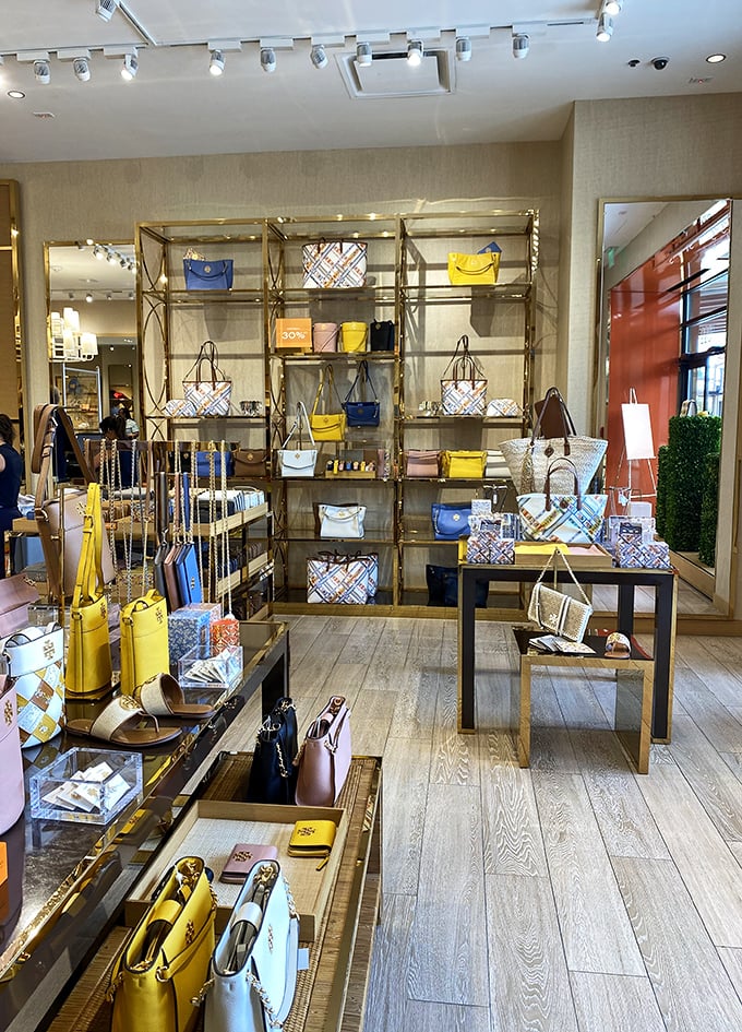 A handbag display that makes your inner fashionista do cartwheels while your budget-conscious brain performs complex mathematical gymnastics.