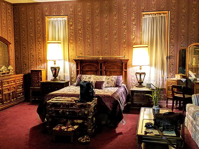 Sleep like royalty in chambers adorned with rich wallpaper and antique-inspired furnishings. The plush bedding promises dreams of medieval grandeur without the medieval discomfort.