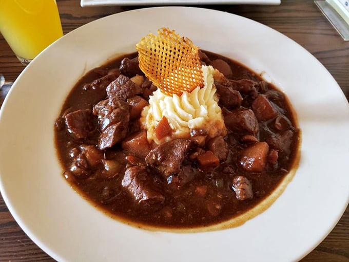Not just stew, but a burgundy-rich celebration of slow-cooked beef, with a cloud of mashed potatoes playing the perfect supporting role.