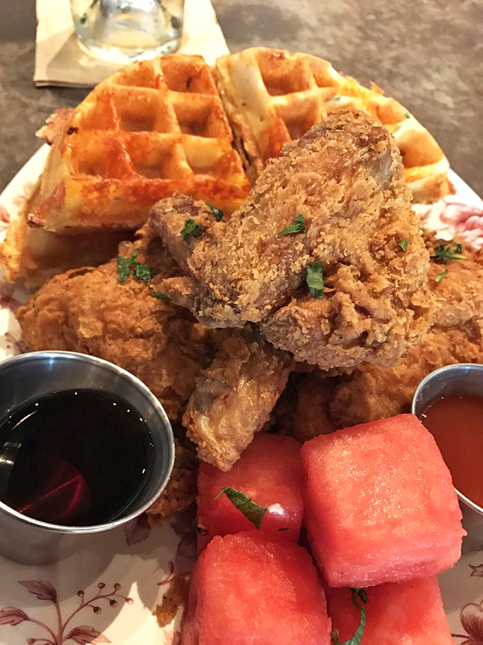 Architecture students, take note: this is structural perfection. Crispy chicken fortress, waffle foundation, watermelon cooling system—engineering you can eat.