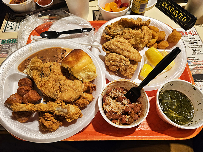 Southern buffet artistry at its finest &ndash; two plates barely containing a symphony of fried chicken, sides, and the promise of a glorious food coma.