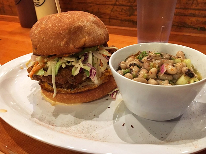 The sandwich that launched a thousand return visits&mdash;fried chicken nestled with slaw and black-eyed peas that somehow make virtue and vice coexist beautifully.