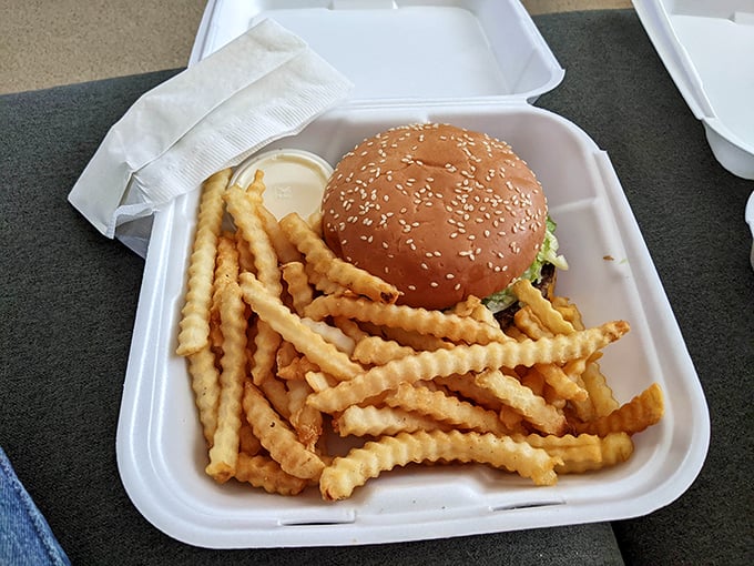 The perfect combo: a pristine burger and crinkle-cut fries that will make your taste buds dance.