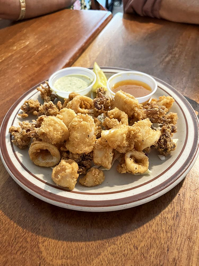 Calamari so perfectly fried, you'll forget every rubbery, sad airport version you've ever suffered through. This is redemption in food form.