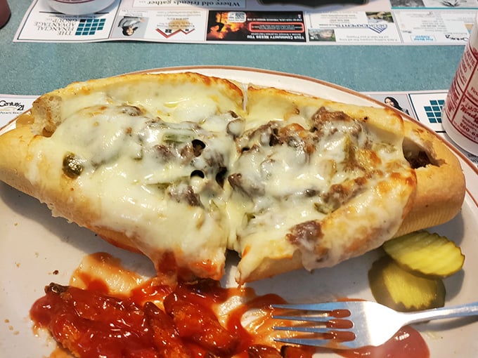 Melted cheese stretching for miles over seasoned steak on a toasted roll. Lunch at Dom's proves they're not just breakfast wizards.