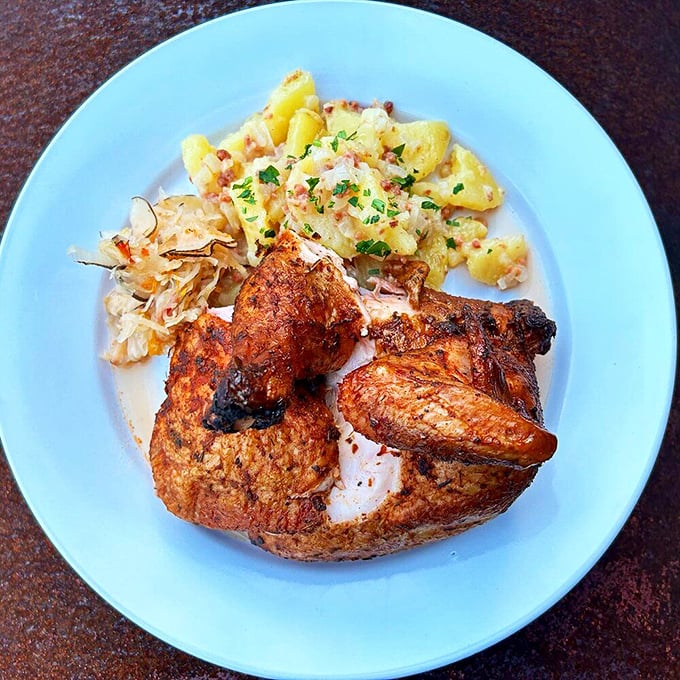 Chicken that's had a more thorough smoke treatment than a 1970s rock concert. Paired with mac and cheese that's clearly living its best life.