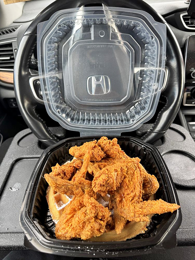 Car dining at its finest &ndash; this chicken and waffle combo turns your Honda into a five-star restaurant. Steering wheel: now the world's best dining table.