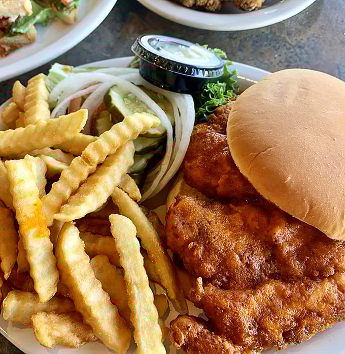 This breaded pork tenderloin sandwich &ndash; fried to golden perfection with crispy crinkle-cut fries &ndash; is the Midwest's answer to coastal food snobbery.