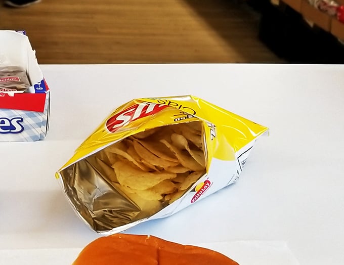 No fancy truffle fries needed here. A bag of chips is the perfect sidekick to Dovie's legendary burgers—simple, crispy companionship.