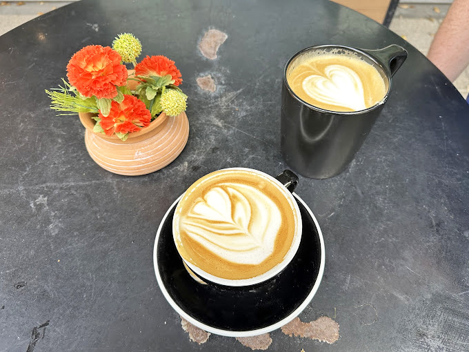 Two cups are better than one, especially when they're this photogenic. Fresh flowers and fresh coffee&mdash;nature's perfect companions for solving all of life's problems.