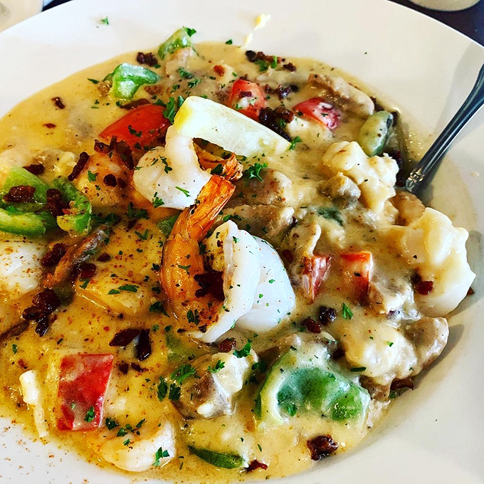 Every spoonful delivers a perfect ratio of shrimp to grits to sauce. The kind of dish that makes you close your eyes involuntarily with each bite.