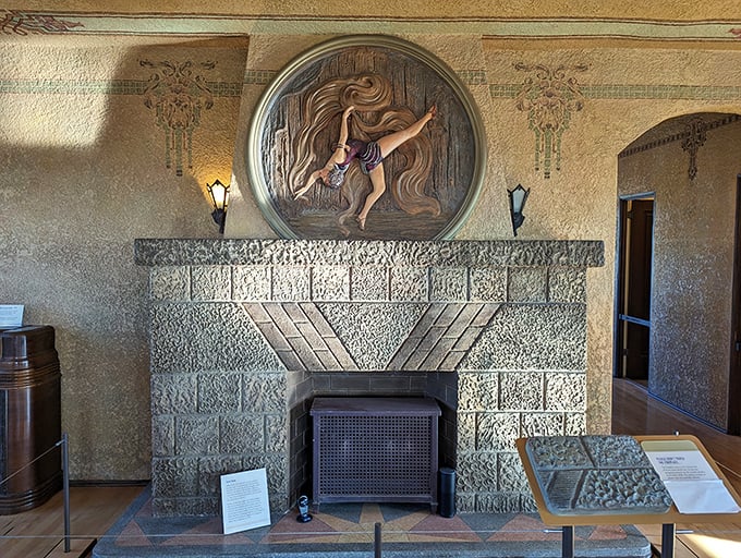 That striking relief above the fireplace isn't just decorative—it's a time capsule of 1920s artistry, when desert homes blended function with unexpected elegance.