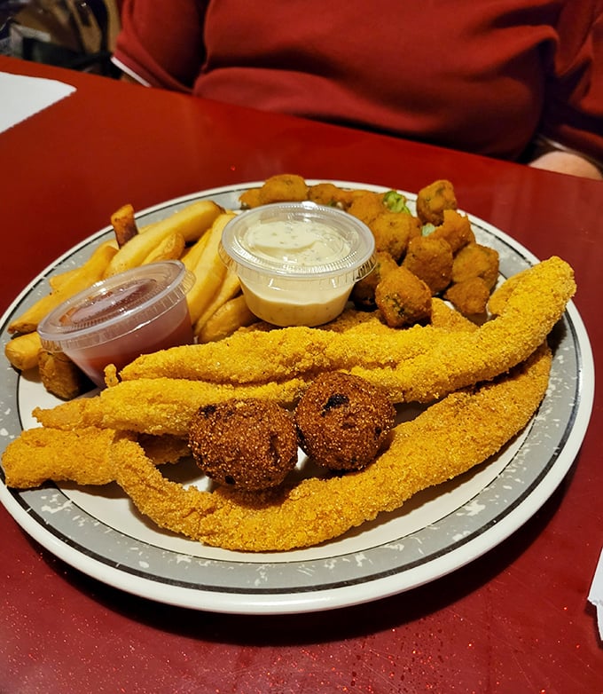 Seafood in Oklahoma? This cornmeal-crusted catfish and golden shrimp prove that inland waters can deliver coastal-worthy delights.