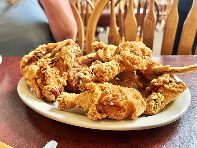 Fried chicken that would make Colonel Sanders question his life choices. Golden, crackling exterior giving way to juicy meat&mdash;this is poultry elevated to art form.