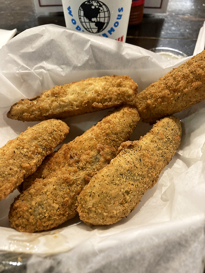 These aren't your average pickle spears. They've been transformed into crunchy, golden wands of tangy perfection that disappear faster than you'd expect.