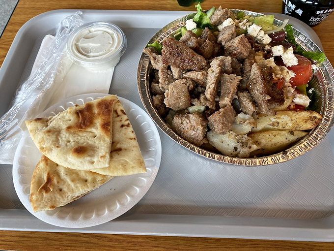 The holy trinity of Greek fast-casual: pillowy pita, protein-packed gyro meat, and a Greek salad that actually respects the tomato enough to use ripe ones.