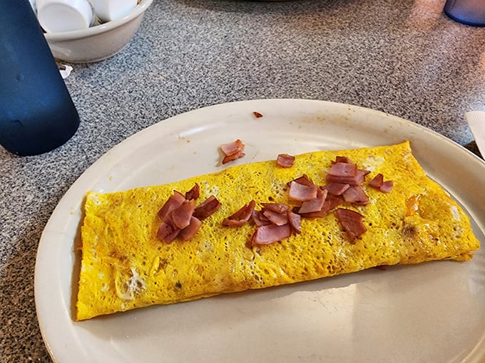 This ham-packed omelet isn't messing around. It's the kind of breakfast that says, "Go ahead, skip lunch. I've got you covered."