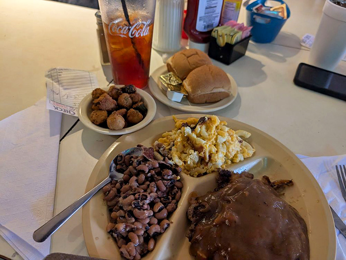 A plate that would make your grandmother proud&mdash;hamburger steak, gravy, black-eyed peas, and mac and cheese. The South's answer to Prozac.