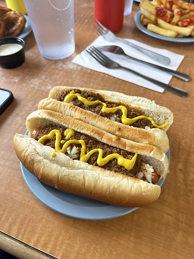 Hot dogs wearing their chili and mustard like a well-earned uniform. These Hormel classics snap with each bite, transporting you straight to summer, regardless of season.