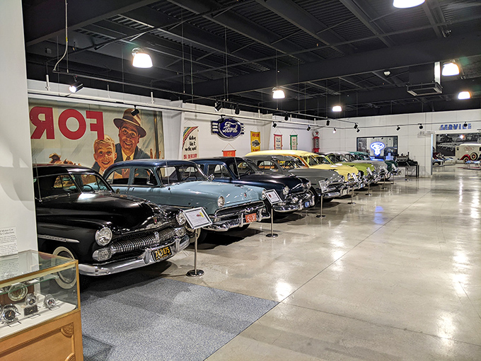 A rainbow of vintage Fords lined up like well-dressed guests at the world's most stylish mechanical reunion.
