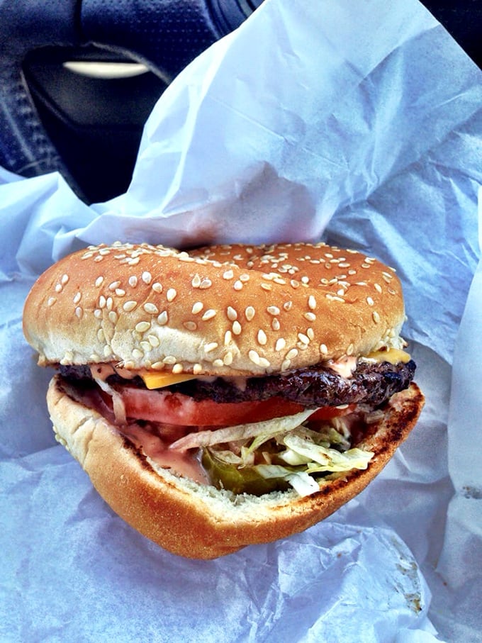 All the essential food groups represented in one handheld masterpiece: beef, cheese, veggies, and that magical fifth group &ndash; satisfaction.