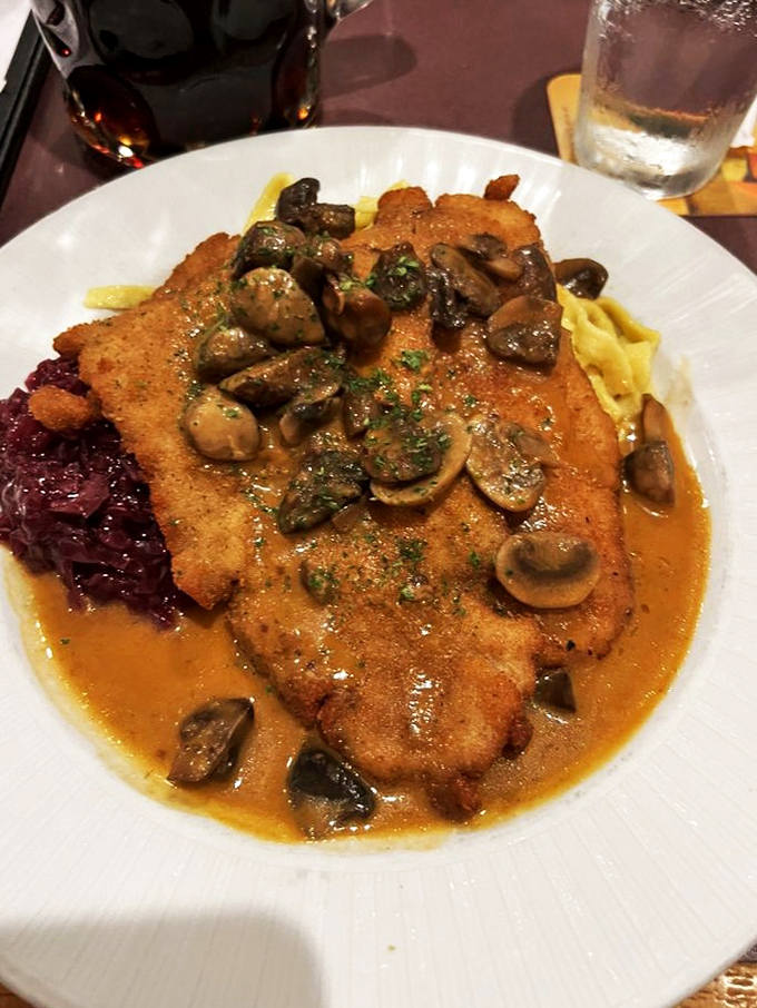 Jägerschnitzel: where a perfectly crisp cutlet meets a mushroom sauce so rich it could buy a small country.