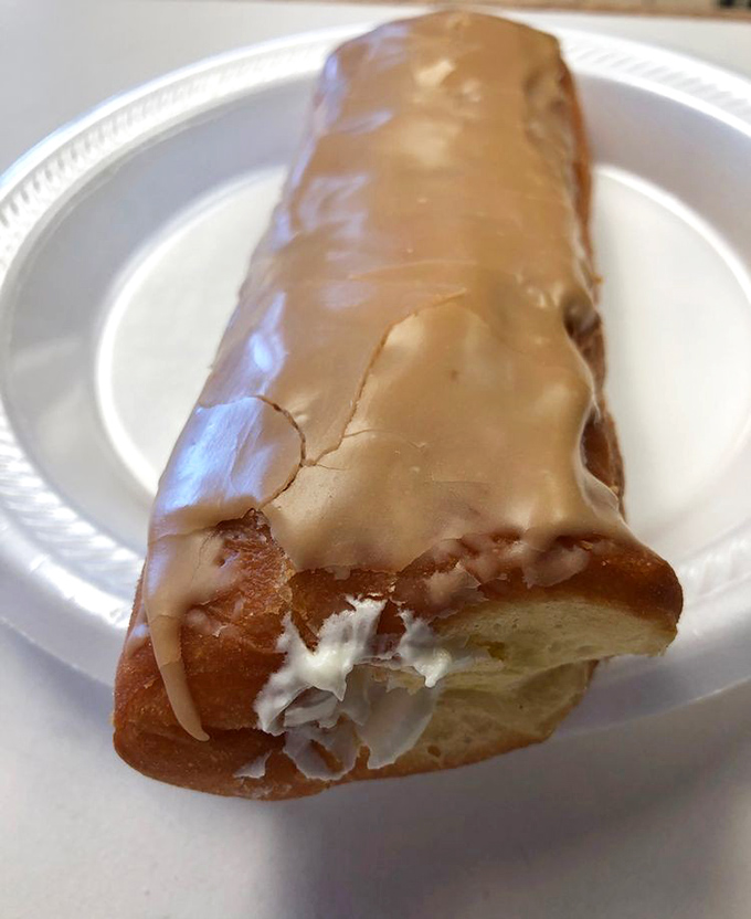 The long john: breakfast's answer to "go big or go home." That cream filling isn't just hiding inside&mdash;it's waiting to make your Monday feel like a Saturday.