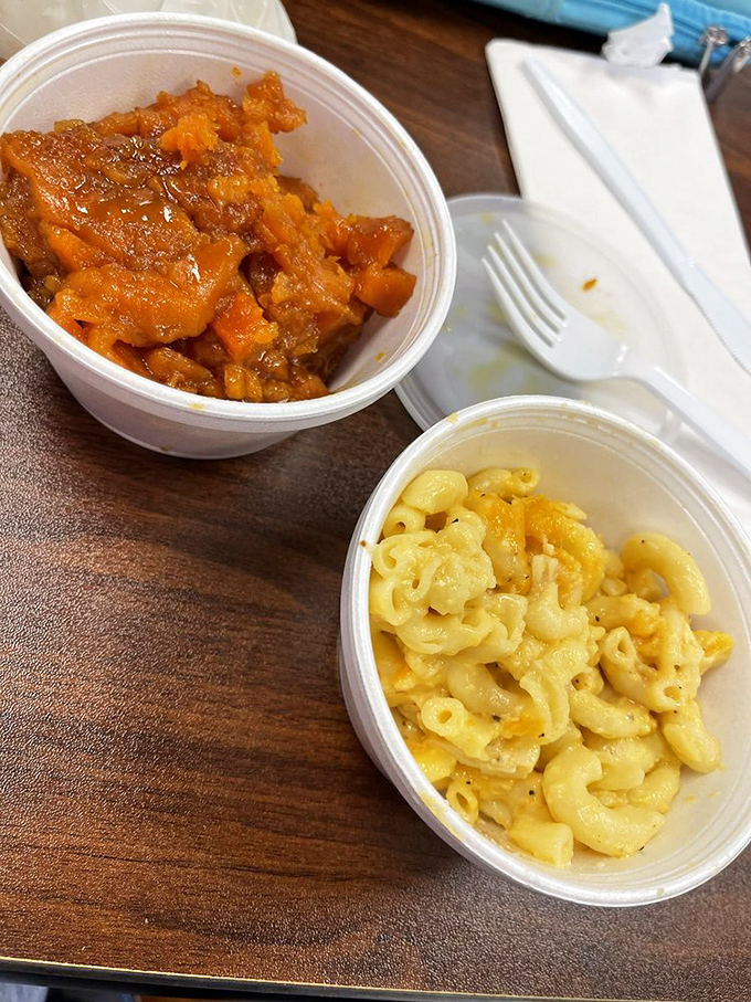 A dynamic duo that belongs in the Comfort Food Hall of Fame&mdash;candied yams glowing with sweetness alongside mac and cheese that defines decadence.