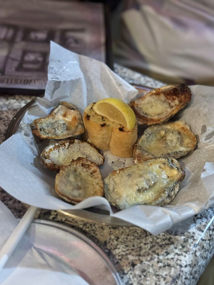 Chargrilled oysters that have been kissed by flame and blessed with butter – the kind of simple perfection that needs nothing more than a squeeze of lemon.