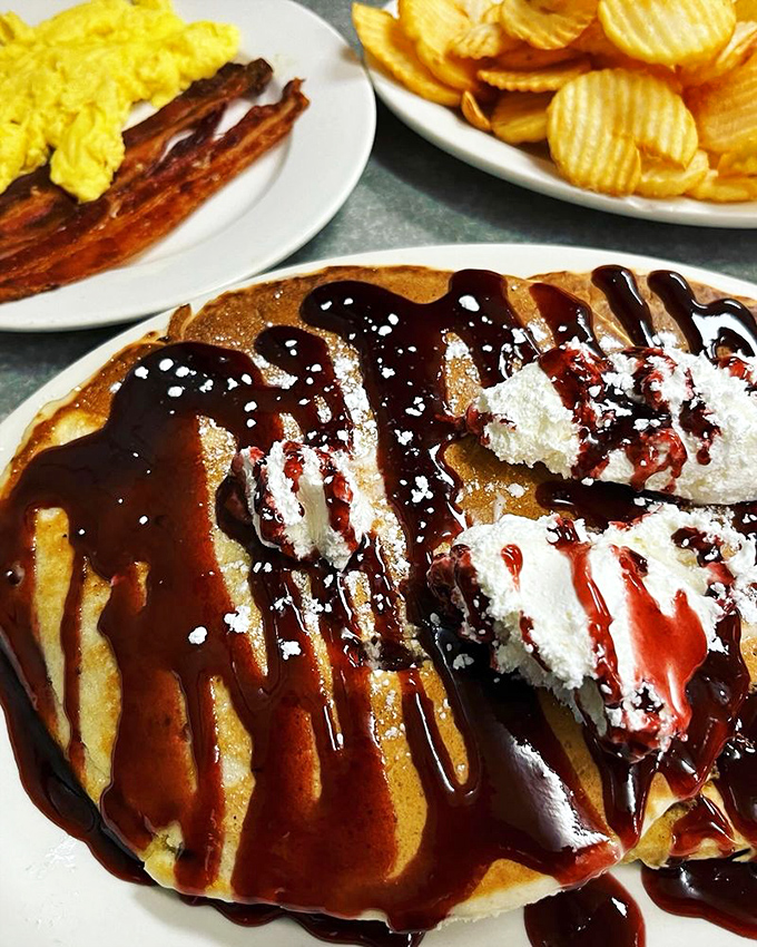 Pancake poetry in chocolate chip form&mdash;a fluffy canvas drizzled with syrup and whipped cream that turns Monday morning into a celebration.