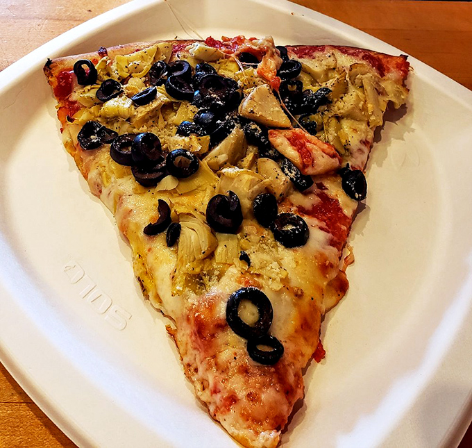 Yes, they serve pizza too! A slice of artisanal pie that proves Grand Ole Creamery understands the importance of the pre-dessert meal.