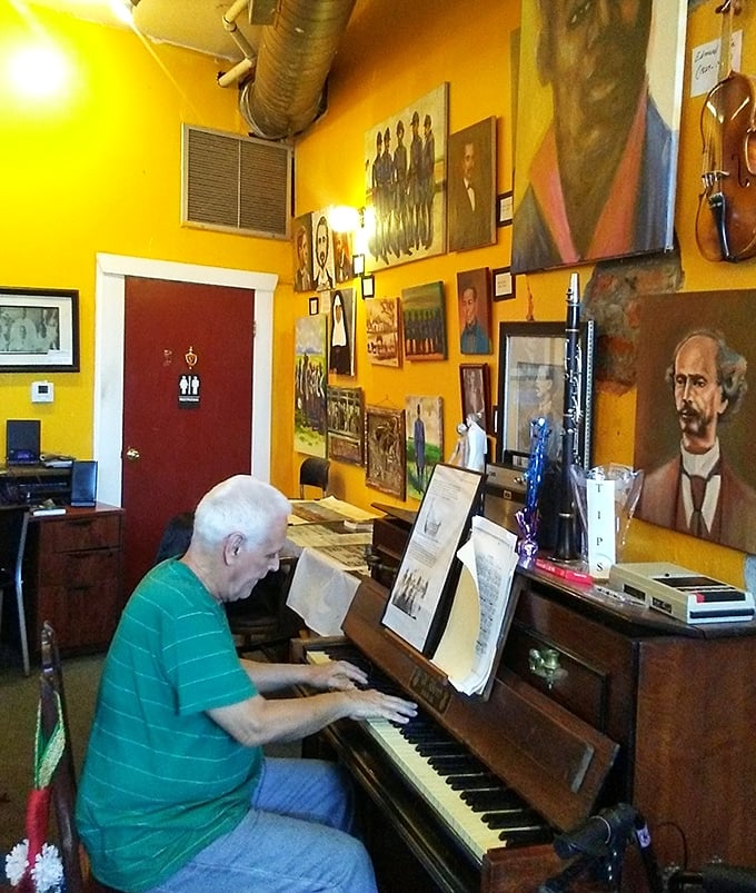 The yellowed walls create a warm backdrop for this intimate musical moment, like stepping into a sepia-toned photograph of jazz history.