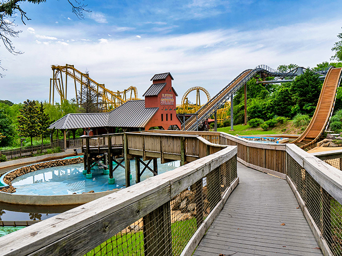 Wooden walkways lead to towering coasters, where the anticipation of climbing that first hill might be more thrilling than the drop itself.